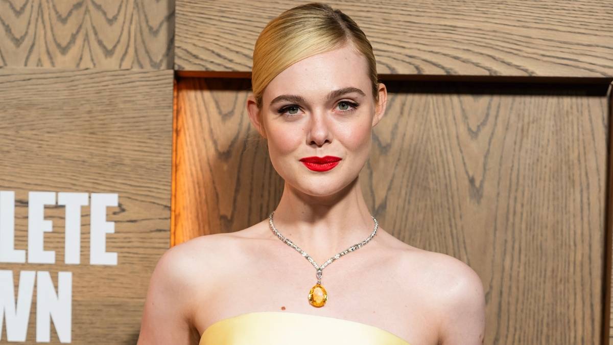 Elle Fanning Stuns in Givenchy Dress With Bold Neckline - theFashionSpot