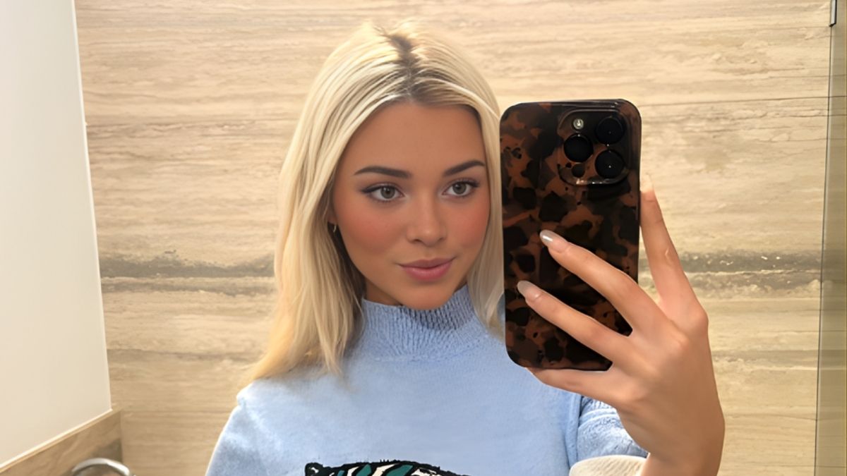 Livvy Dunne's Extra Tiny Miniskirt & Sheer Tights Are Flirty Festive ...