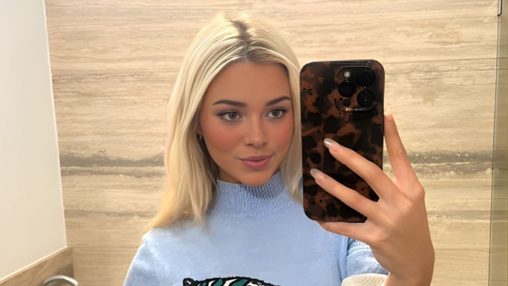 Livvy Dunne's Extra Tiny Miniskirt & Sheer Tights Are Flirty Festive ...