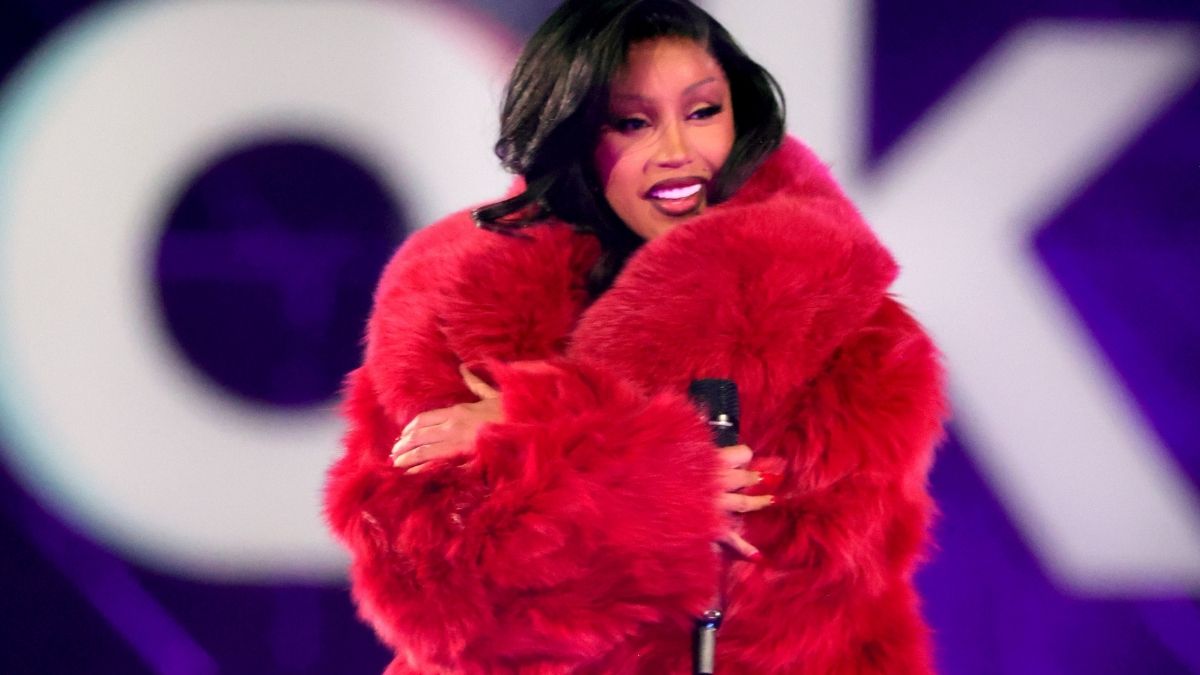Cardi B Flaunts Rap Skills in Bold Red Dress Amid Romance - theFashionSpot