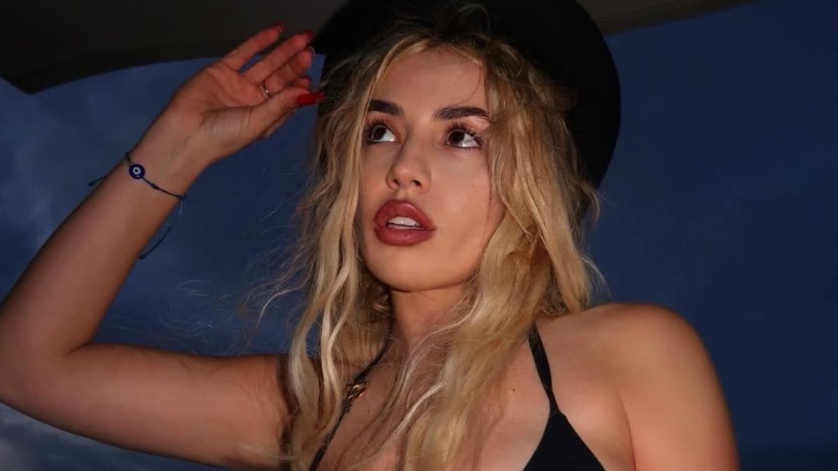 Ava Max Dons Stringy Bikini Top With Just a Towel - theFashionSpot