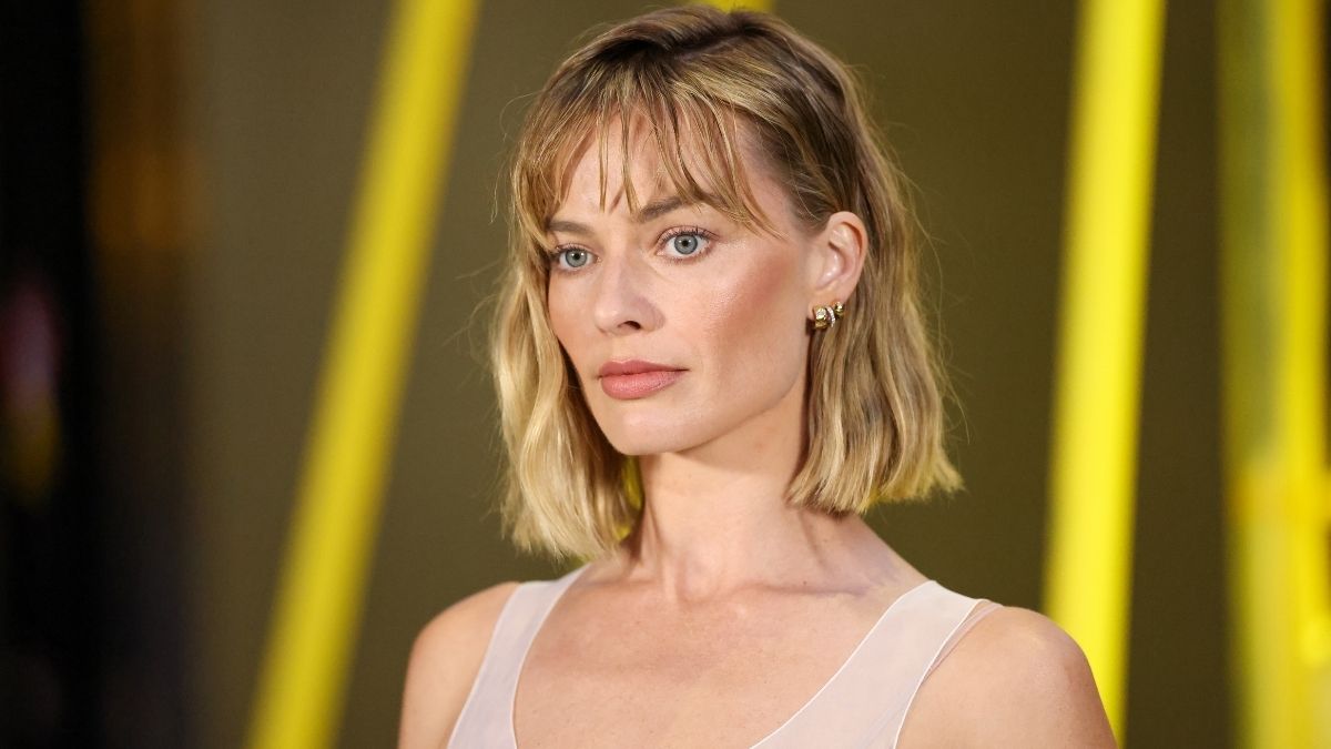 Margot Robbie Slips Into a Strapless Mini Playsuit for Low-Key Outing ...