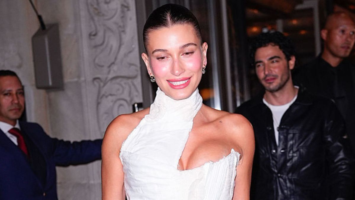 Hailey Bieber's Plunging Guizio Micro Minidress Is Hanging on by 2 ...