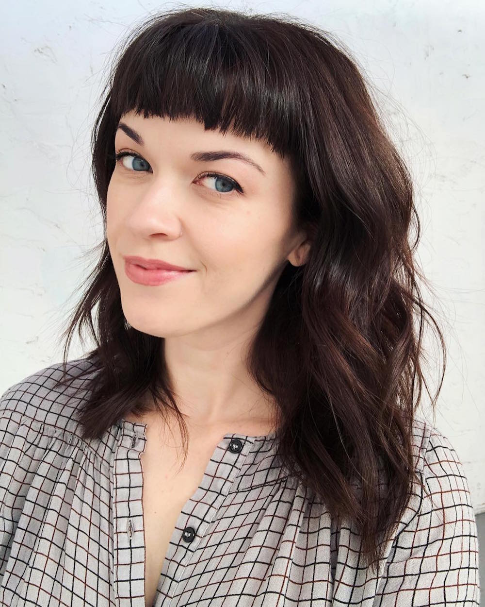How to Pull Off Baby Bangs in the Real World - theFashionSpot