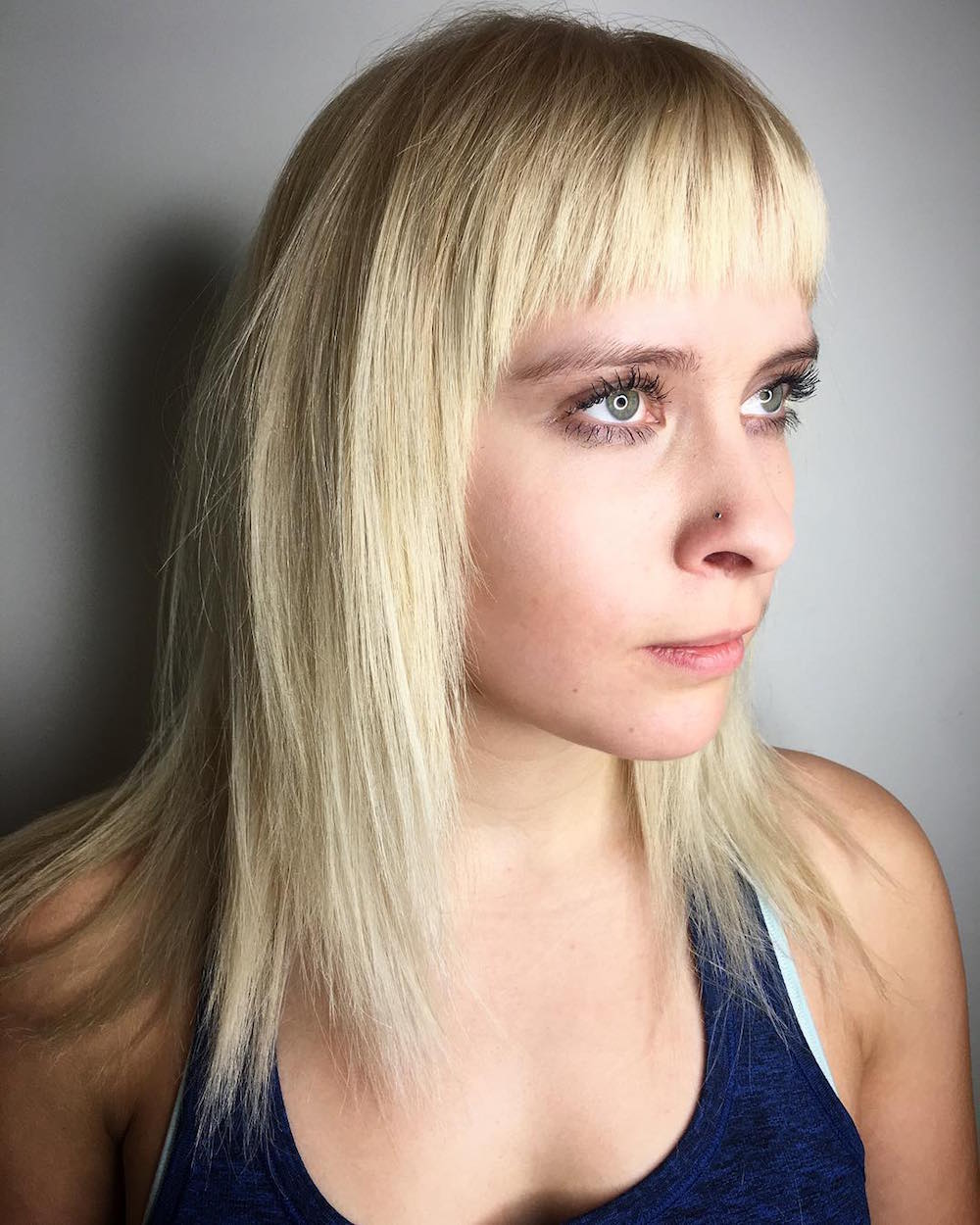 How to Pull Off Baby Bangs in the Real World - theFashionSpot