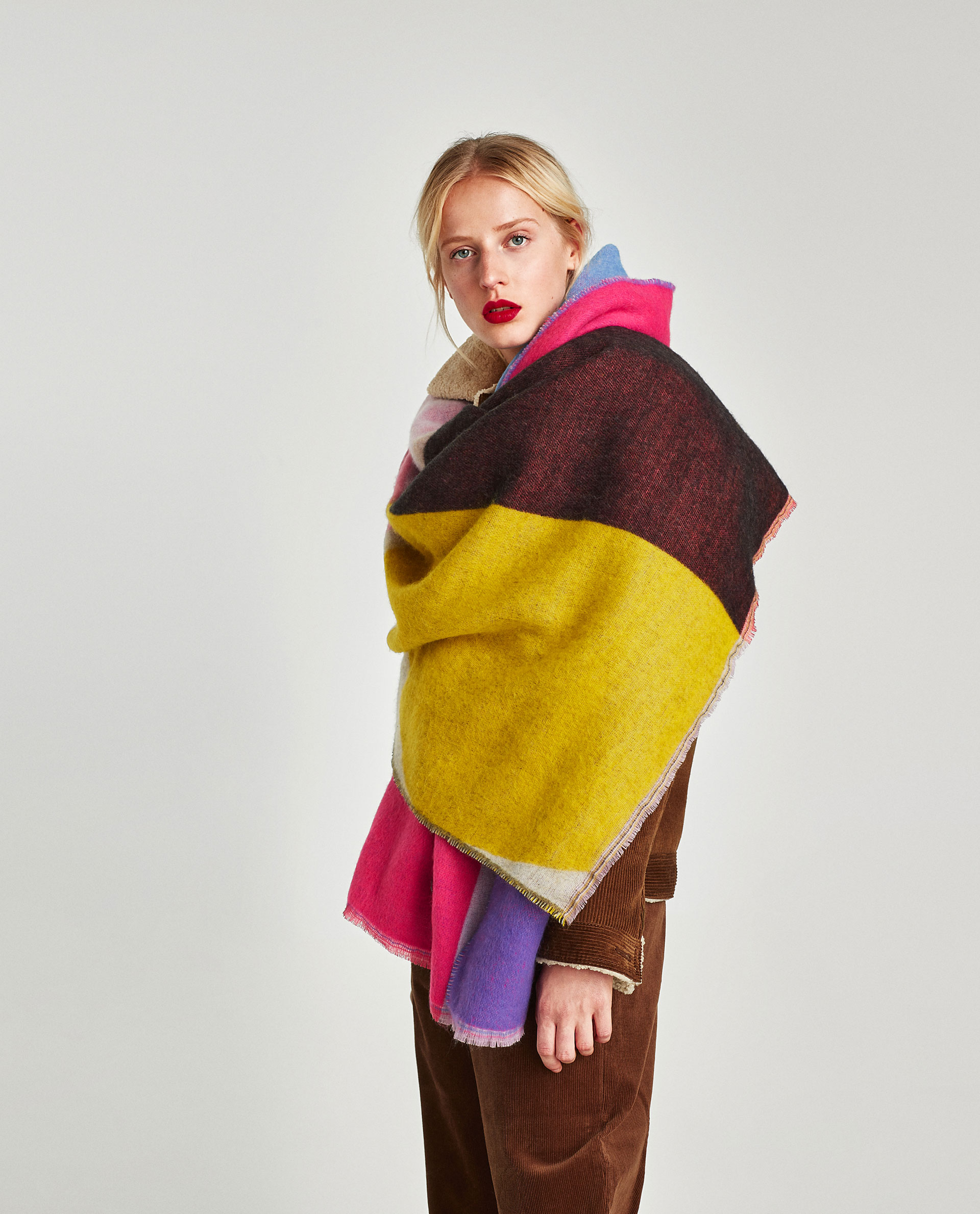 16 Remarkably Fresh and Interesting Ways to Wear a Scarf - theFashionSpot